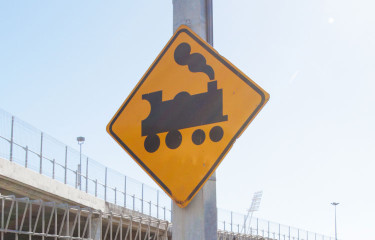 Crossing a railway level crossing | Drive